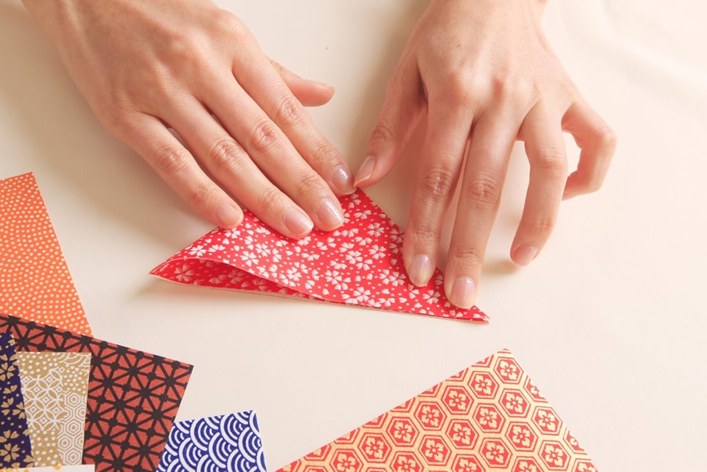 The Mathematics, Laws and Theory Behind Origami Crease Patterns